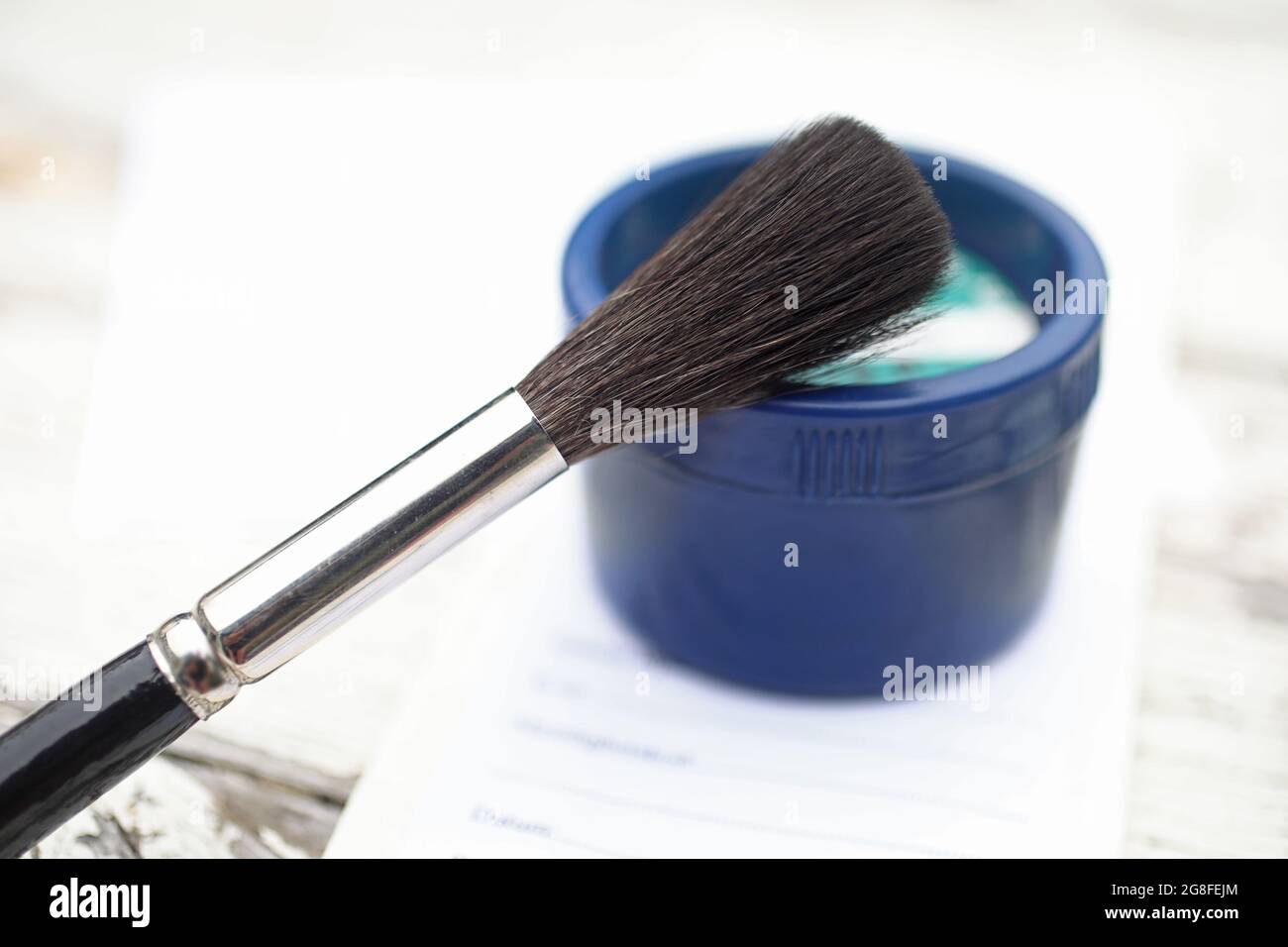Fingerprint brush and black powder which is part of the police's ...