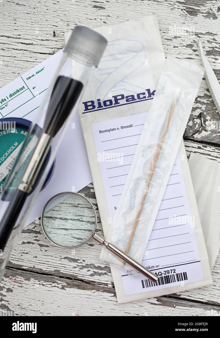 Forensic equipment for fingerprints, magnifying glass and bag for DNA ...