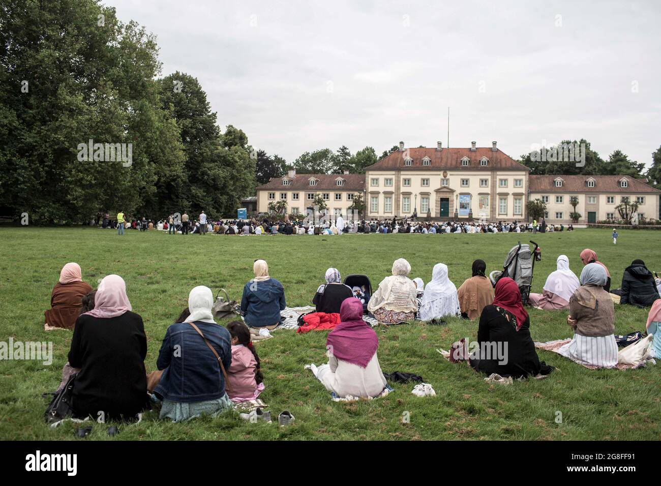 Hanover, Germany. 20th July, 2021. Muslims perform Eid al-Adha prayers ...