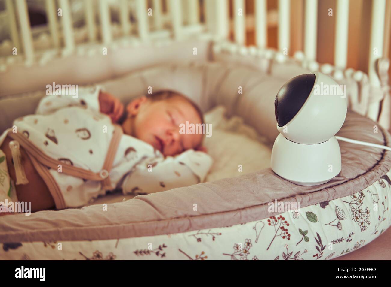 Infant sleeping baby monitor hi-res stock photography and images - Alamy