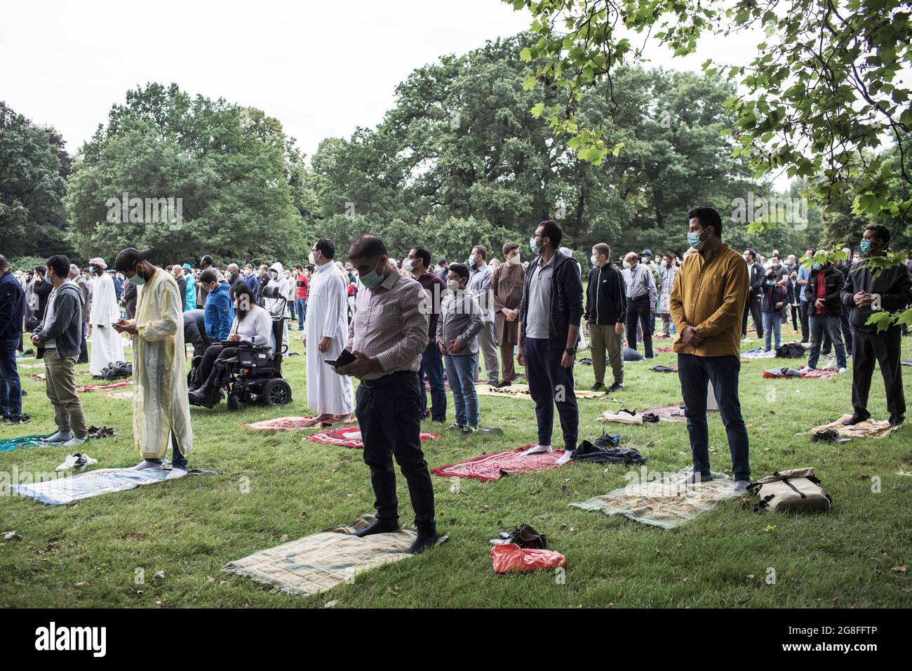 Hanover, Germany. 20th July, 2021. Muslims perform Eid al-Adha prayers ...
