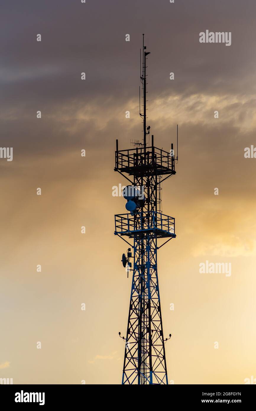 Vertical shot of an overhead electric power line with insulators Stock ...