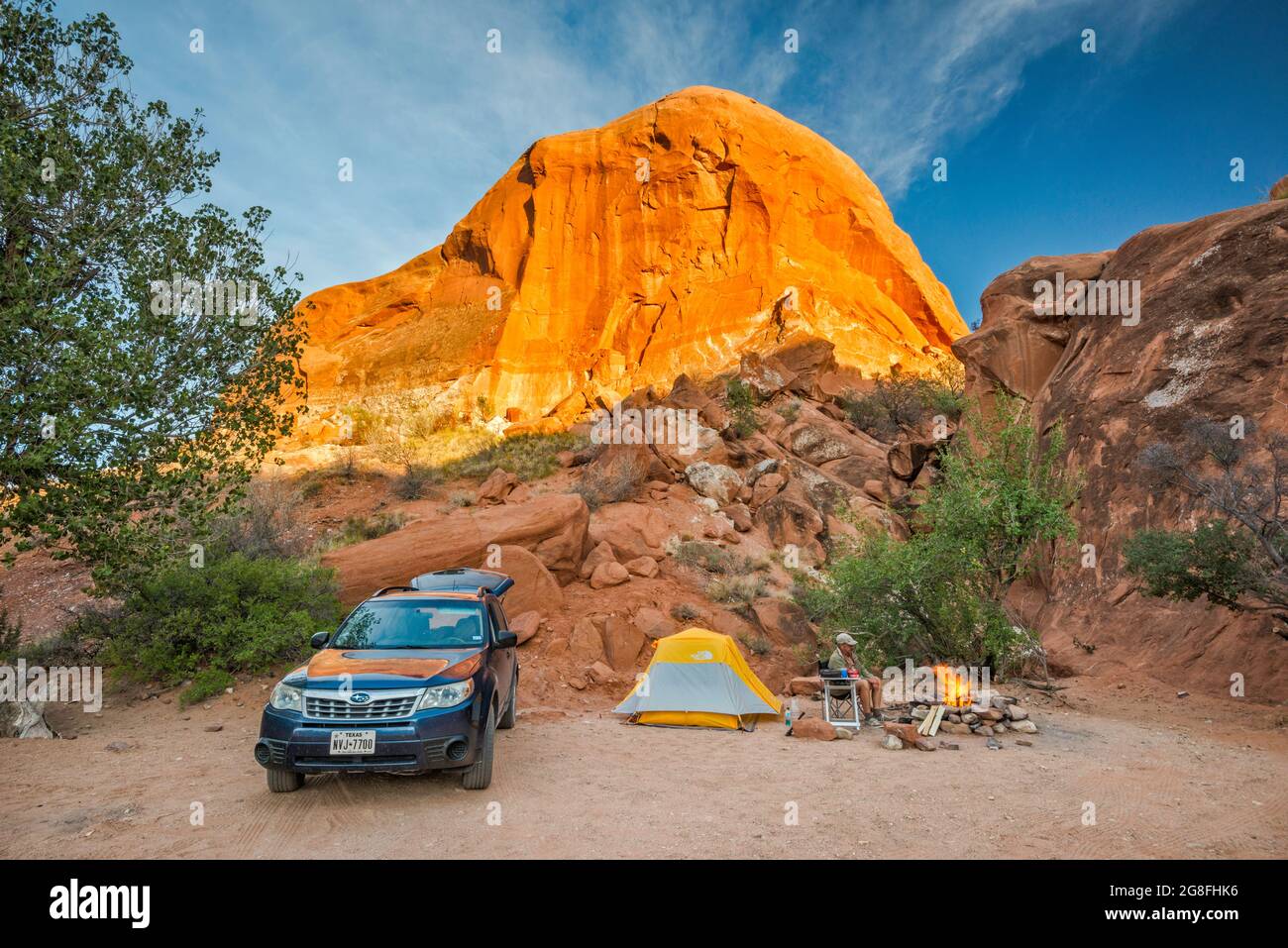 Slickrock formation over campsite at Sooner Rocks, sunset, Hole In The ...