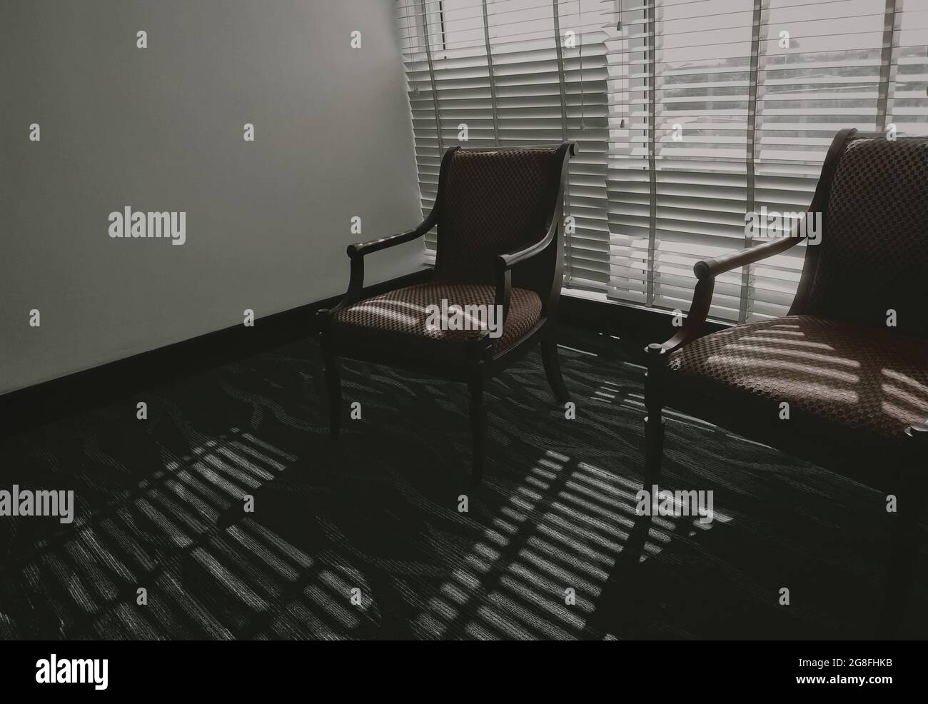 Empty chairs with light and shadow in the room. Furniture for home ...