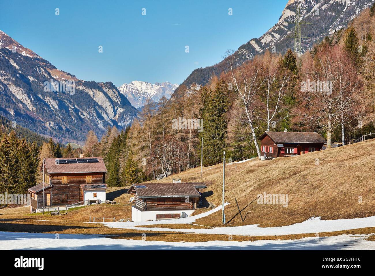 Houses in Kunkels at the end of Taminatal valley near Kunkelspass with ...