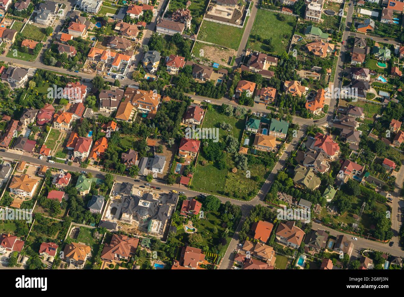 Residential area, rooftops, view from a drone. Cottages in the village ...