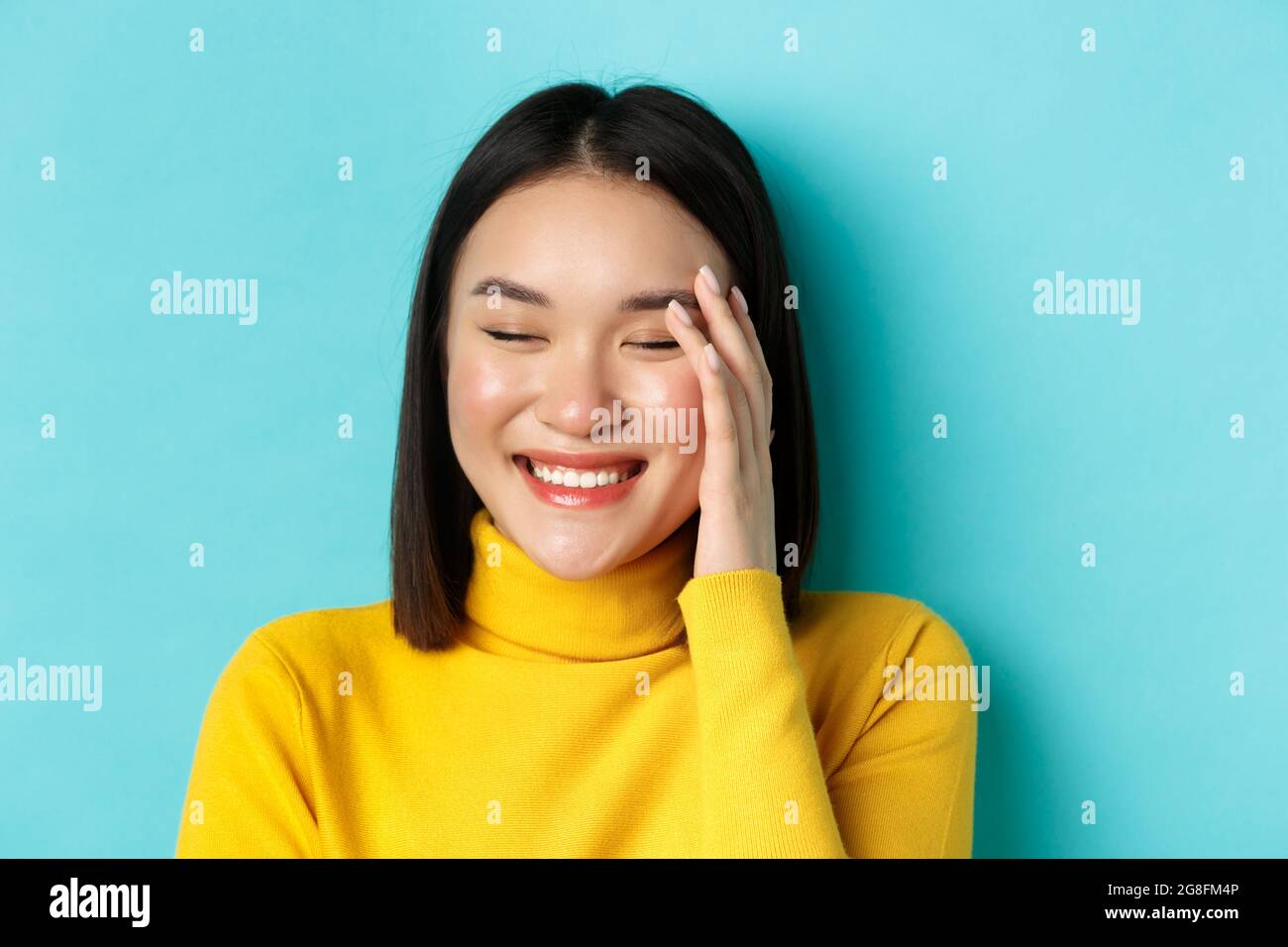 Beauty and makeup concept. Close up of beautiful asian woman laughing ...