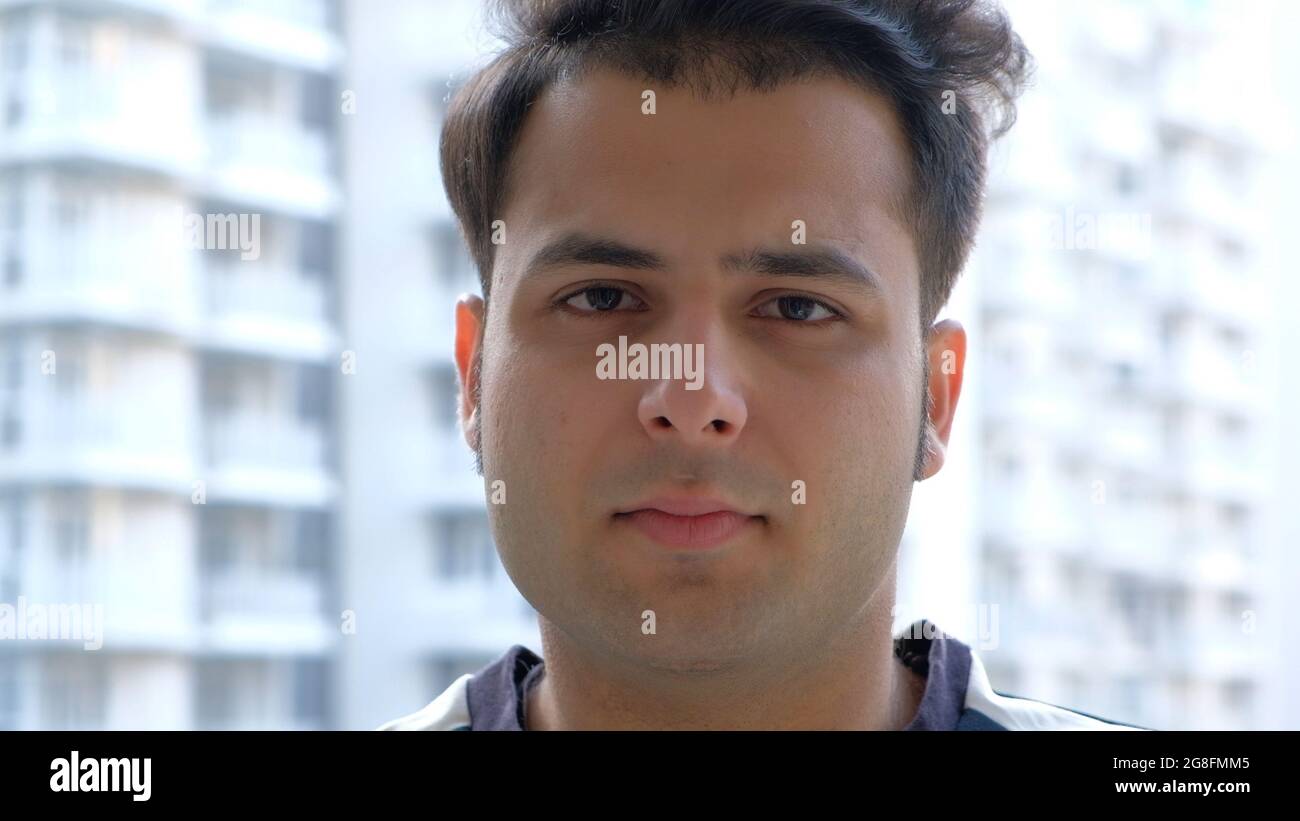 Portrait of a handsome Indian guy Stock Photo - Alamy