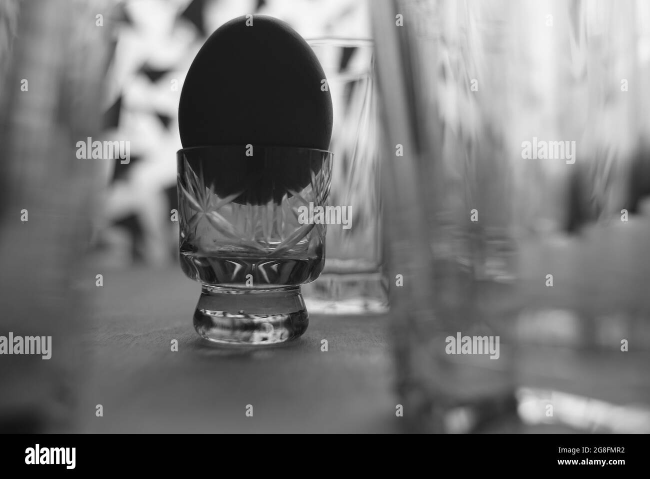 Egg and glass as fragile, wet, hard and strong elements of a household ...