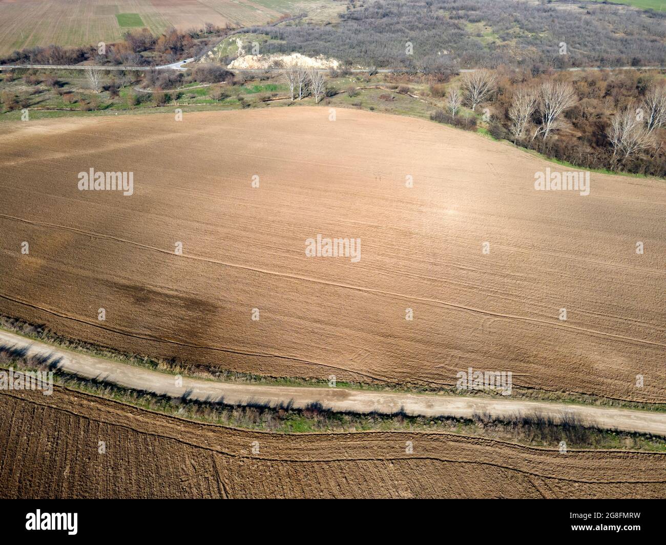 Aerial Sunset view of Upper Thracian Plain near Town of Asenovgrad ...