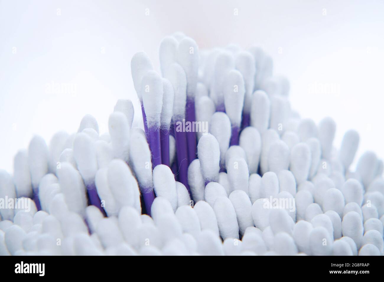 Cotton heads of cleaning hygiene sticks. Cotton swabs. Selective Focus ...