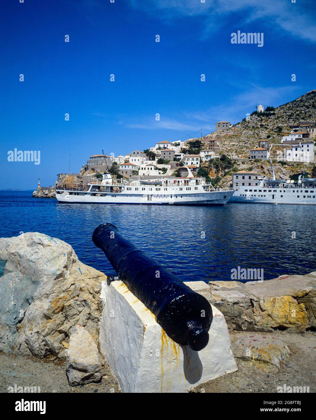 Old artillery cannon at ancient fortification, cruise ships, terraced ...