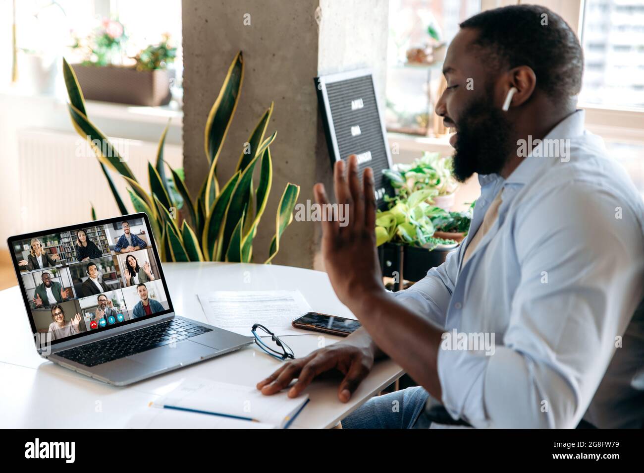 Virtual online meeting by video call. African American man ...