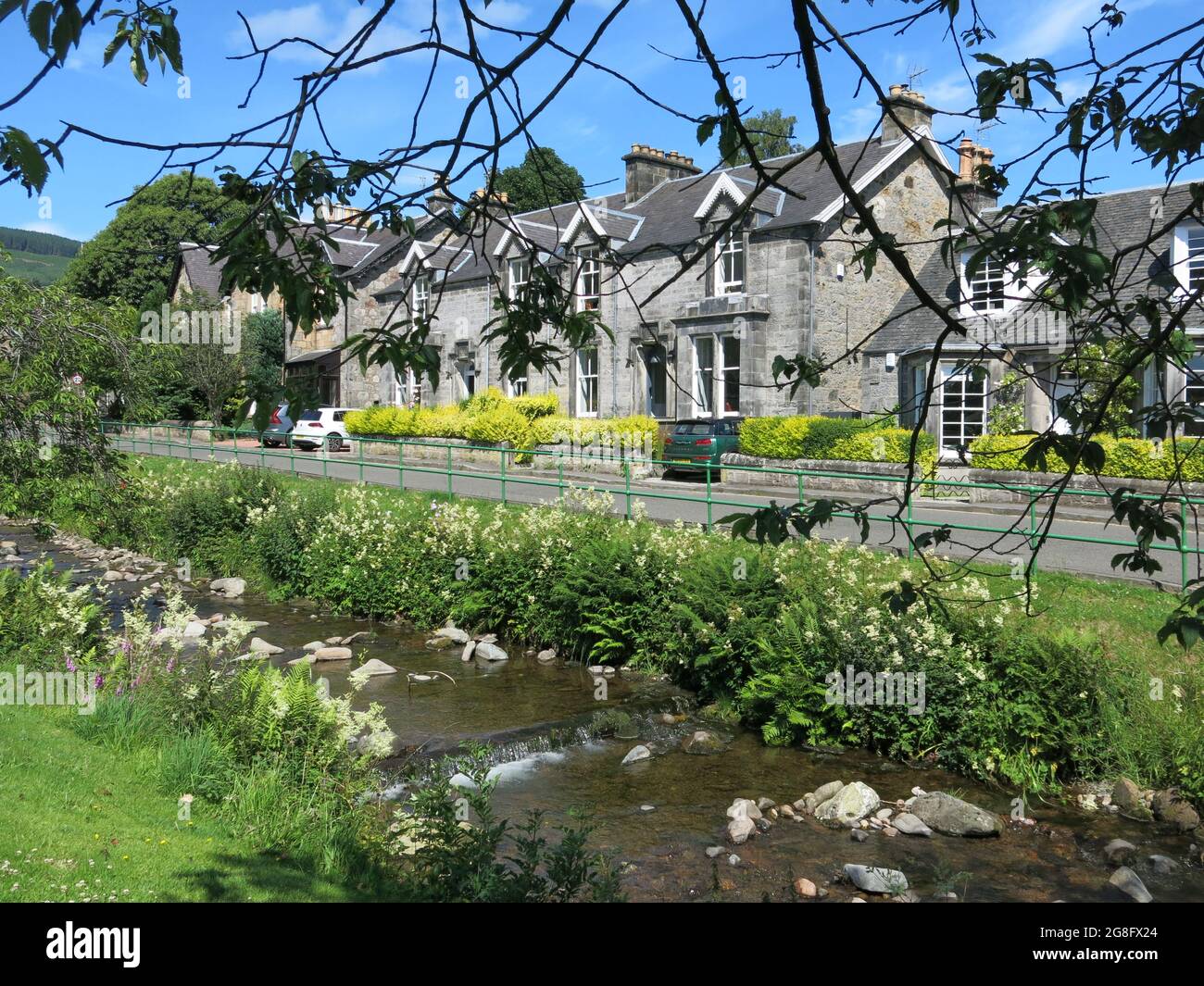 View of the picturesque Scottish village of Dollar with the Dollar Burn ...