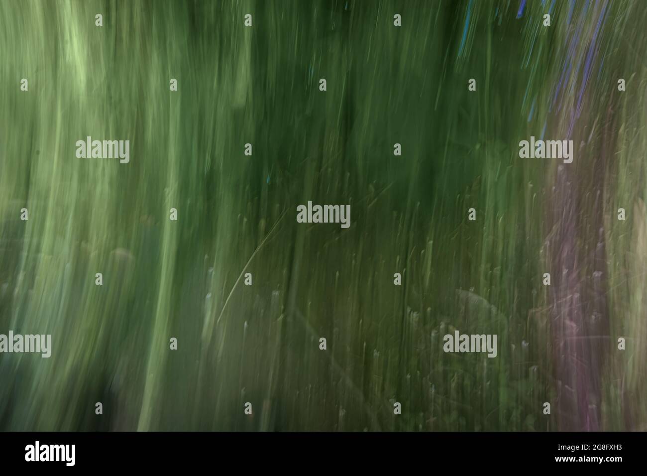 Abstract dirty green background with vertical highlights, spots and ...