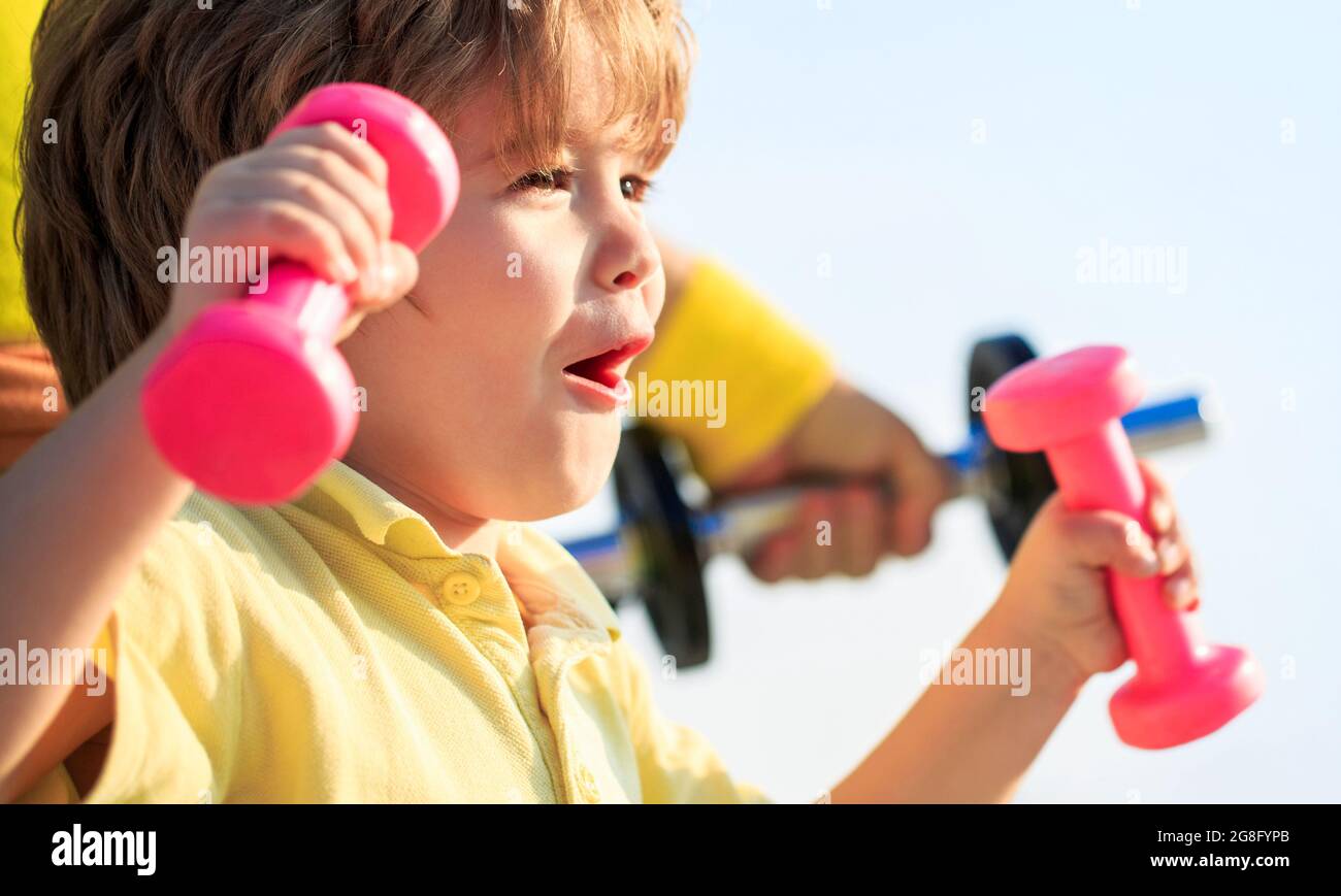 Fitness child. Sporty boy with dumbbells. Sport. Fitness, health and ...