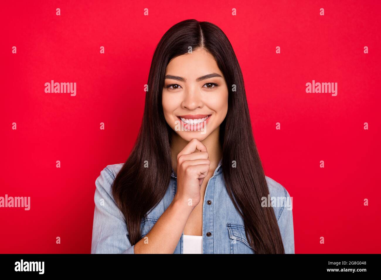 Photo of young cheerful asian girl happy positive smile hand touch chin ...