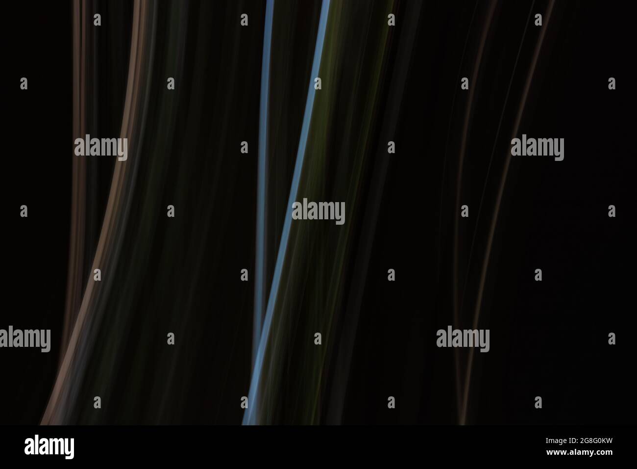 Abstract light-drawn letter V on a black background. Photo effect ...