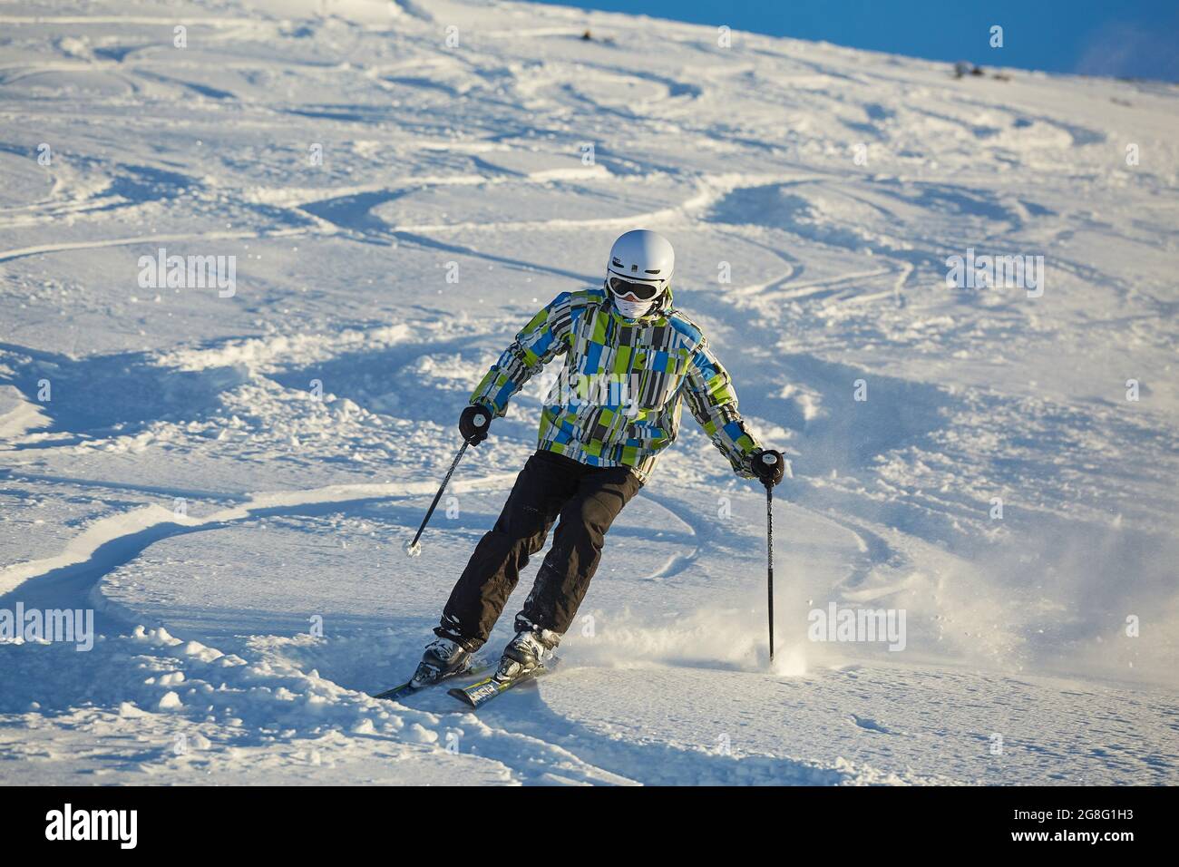 Skiing in fresh powder snow Stock Photo - Alamy
