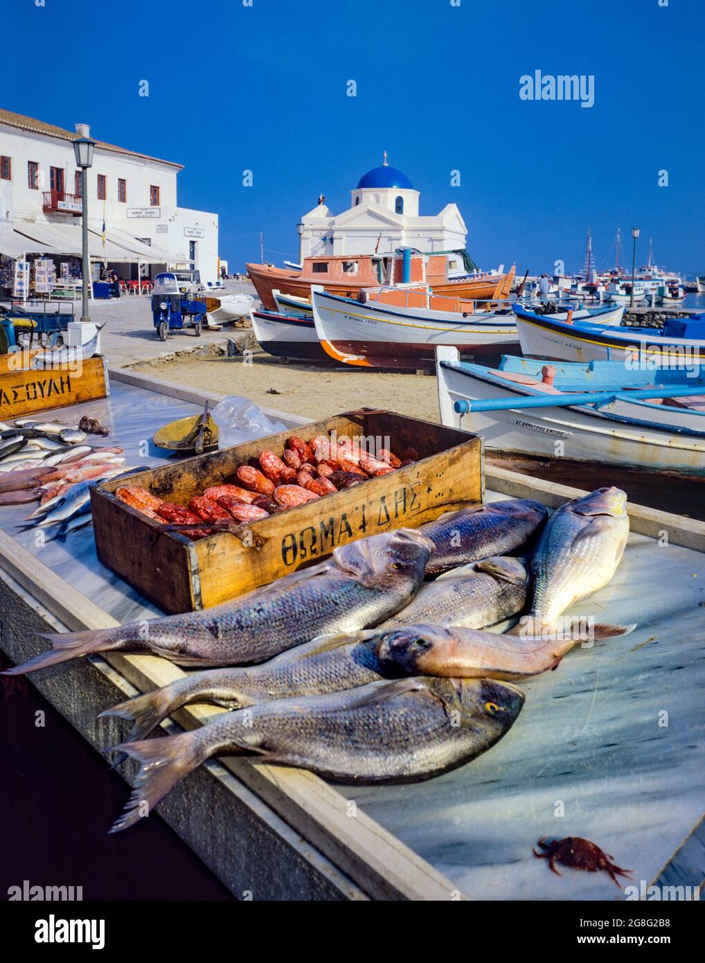 Stall with fishes, fish market, beached fishing boats, St Nicholas ...