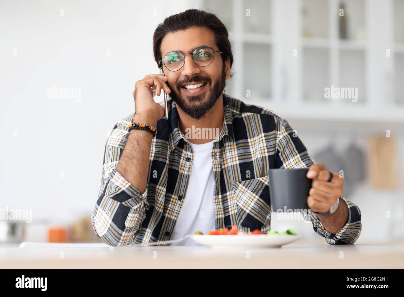 Cheerful handsome arab guy hi-res stock photography and images - Alamy