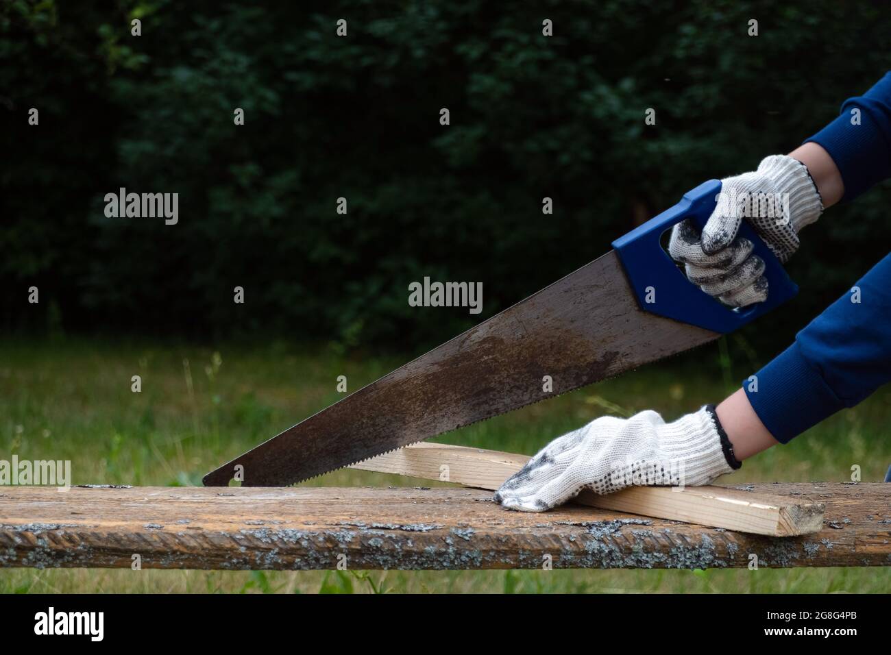 Hand sawing hi-res stock photography and images - Alamy