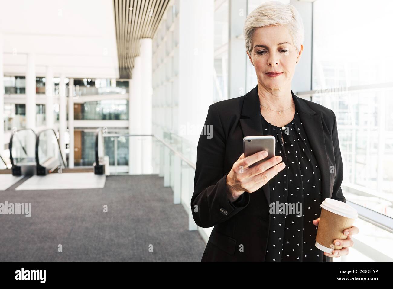 Staying in the know on the go Stock Photo - Alamy