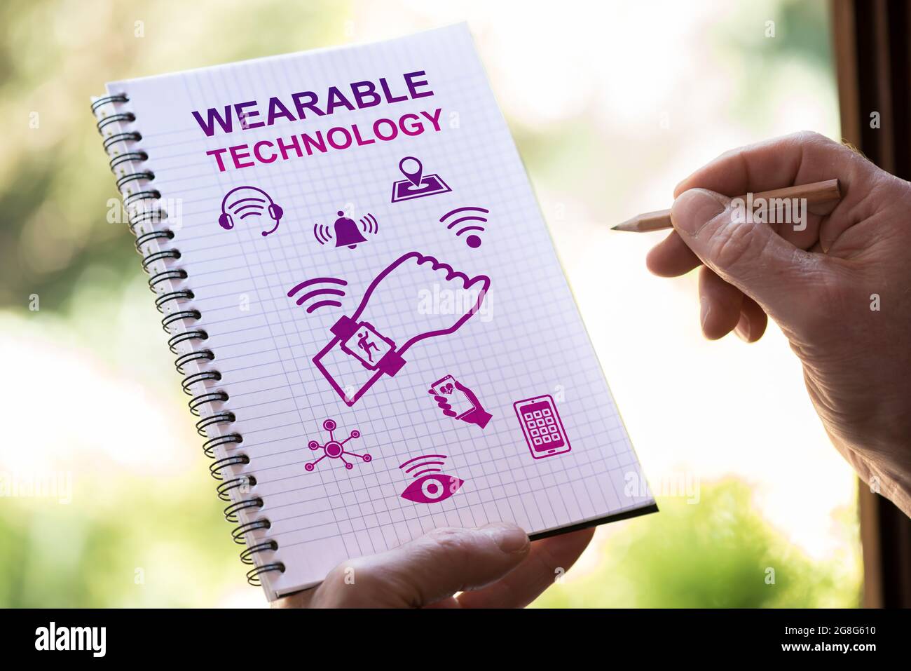 Hand drawing wearable technology concept on a notepad Stock Photo - Alamy