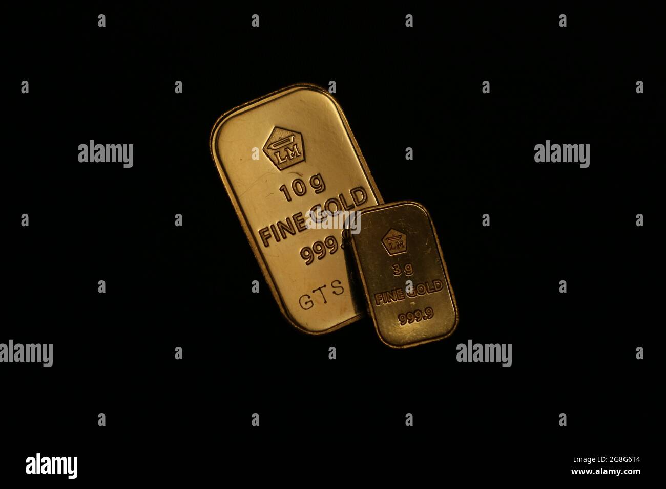 Fine gold bar (goldbar) on black background, produced by PT Aneka ...