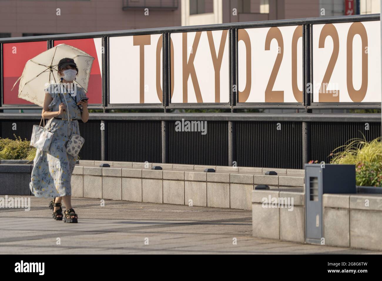 Tokyo, Japan. 20th July, 2021. A Japanese woman wearing an N95 mask ...