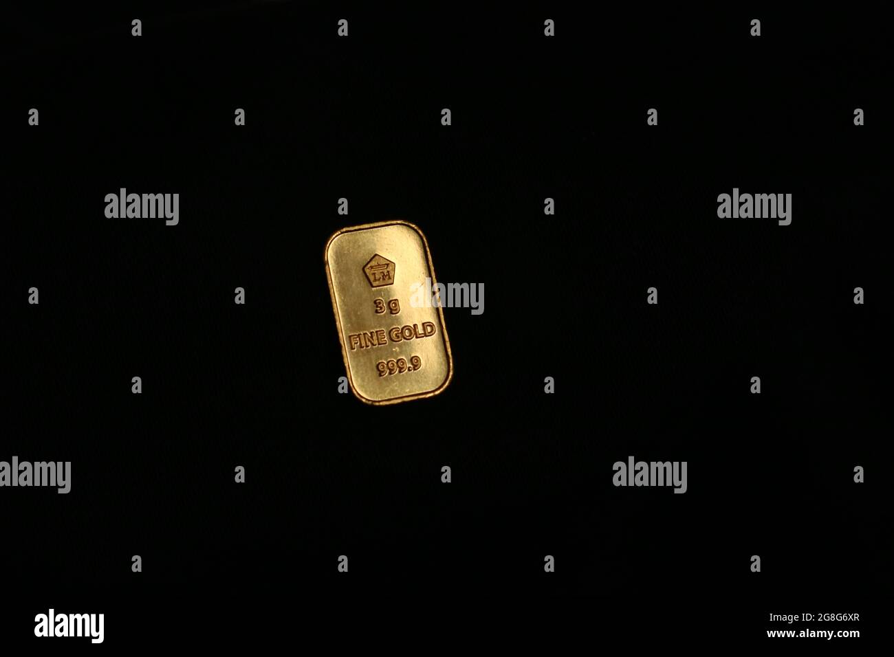 Fine gold bar (goldbar) on black background, produced by PT Aneka ...
