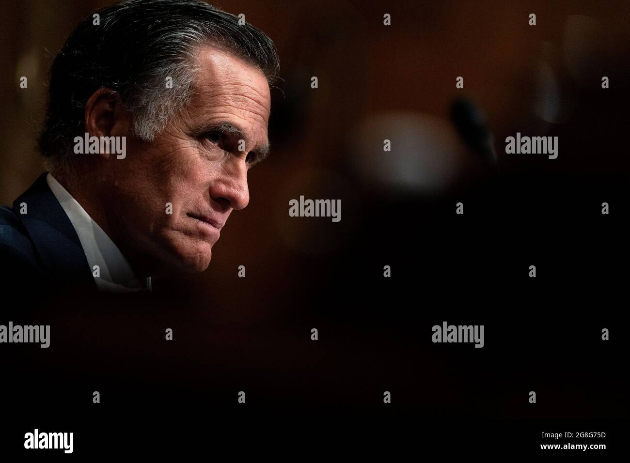 Senator Mitt Romney (R-UT) listens during a Senate Health, Education ...