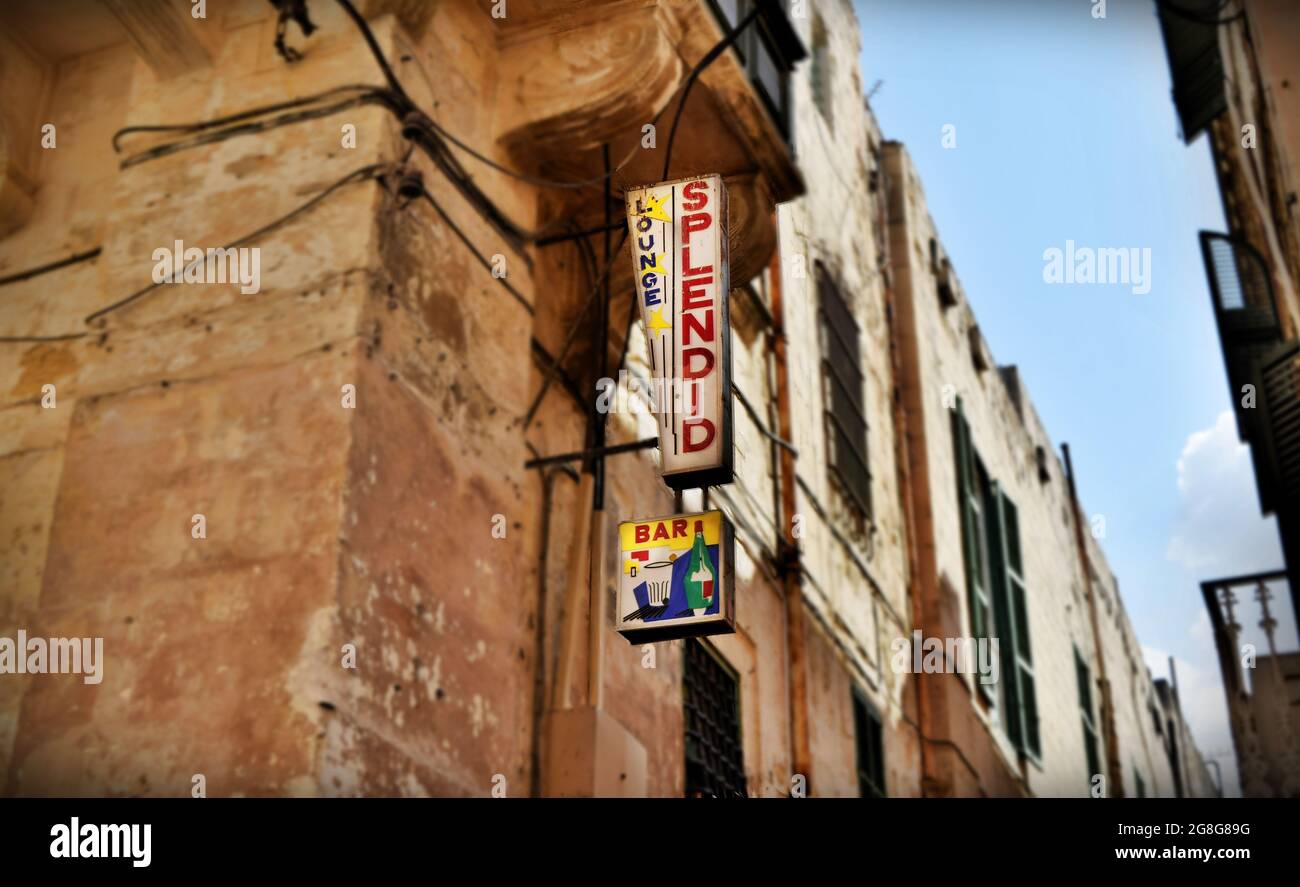 VALLETTA, MALTA - Jun 23, 2016: An old shop or business sign in an old ...