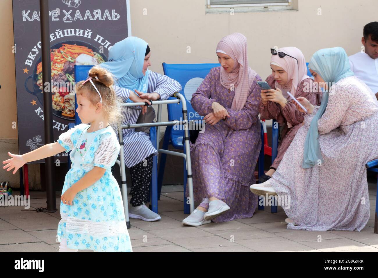 Non Exclusive: KYIV, UKRAINE - JULY 20, 2021 - Women in hijabs chat ...