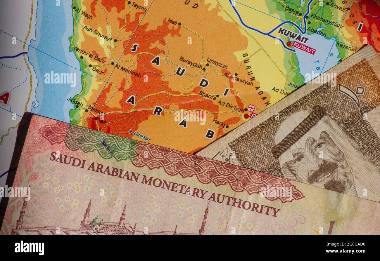 Top view of money, banknote of Saudi Arabian Riyal and the Saudi Arabia ...