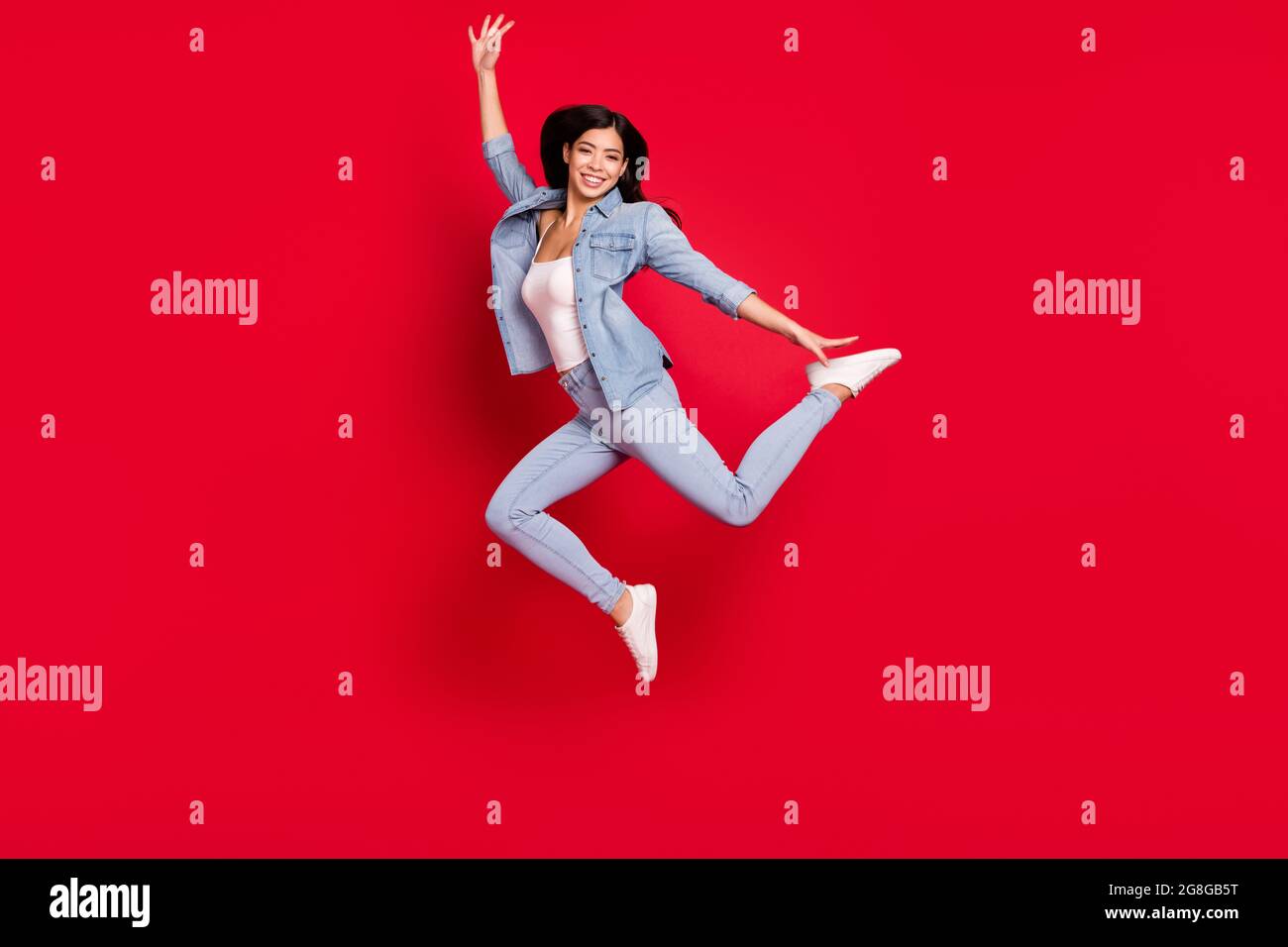 Full length body size view of attractive cheerful girl jumping dancing ...