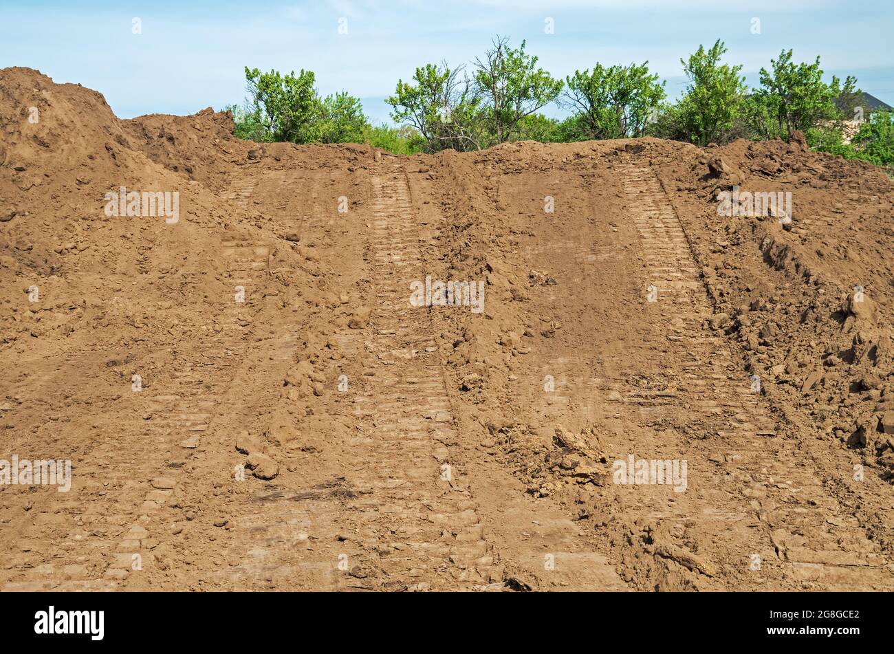 Track marks on loose soil after operating a crawler bulldozer Stock ...