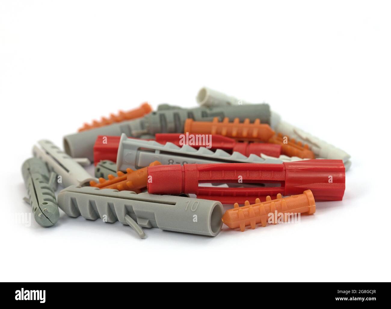 Plastic dowel in front of white background Stock Photo - Alamy