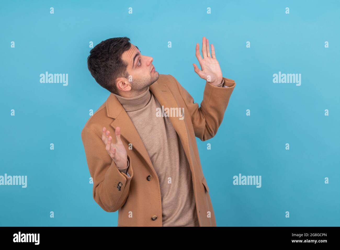 Isolated man looking up hi-res stock photography and images - Alamy