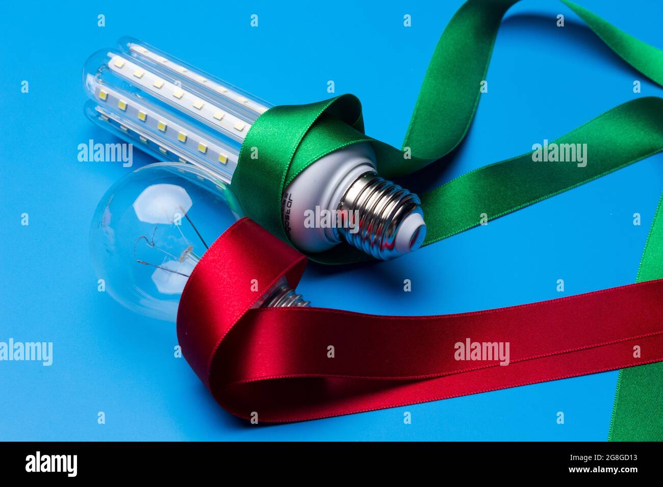 Energy-saving light bulb and classic incandescent bulb with high energy ...