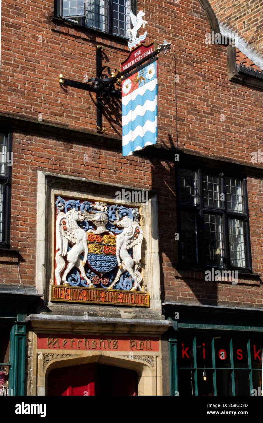 Coat of Arms and Flag of the Merchants Guild, above the door of the ...