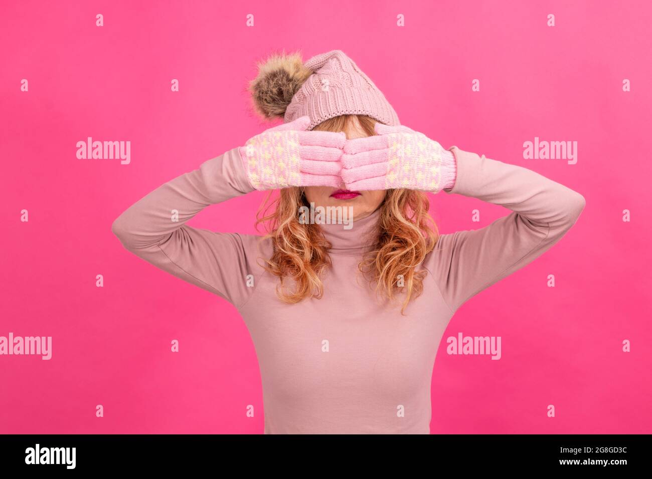 isolated woman with covered eyes Stock Photo - Alamy