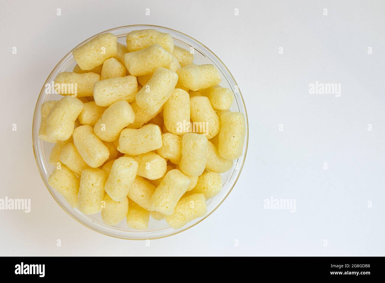 sweet corn sticks in bowl with ampty space for text isolated on white ...
