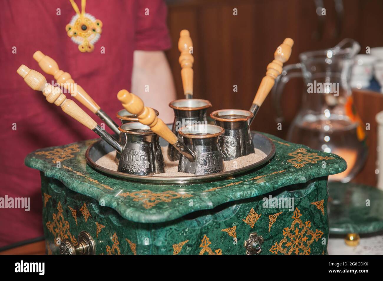 Turkish coffee brewed on sand in cezve. Oriental, east coffee Stock ...