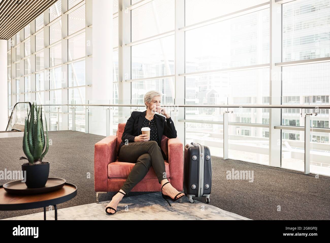 Female travel expert hi-res stock photography and images - Alamy