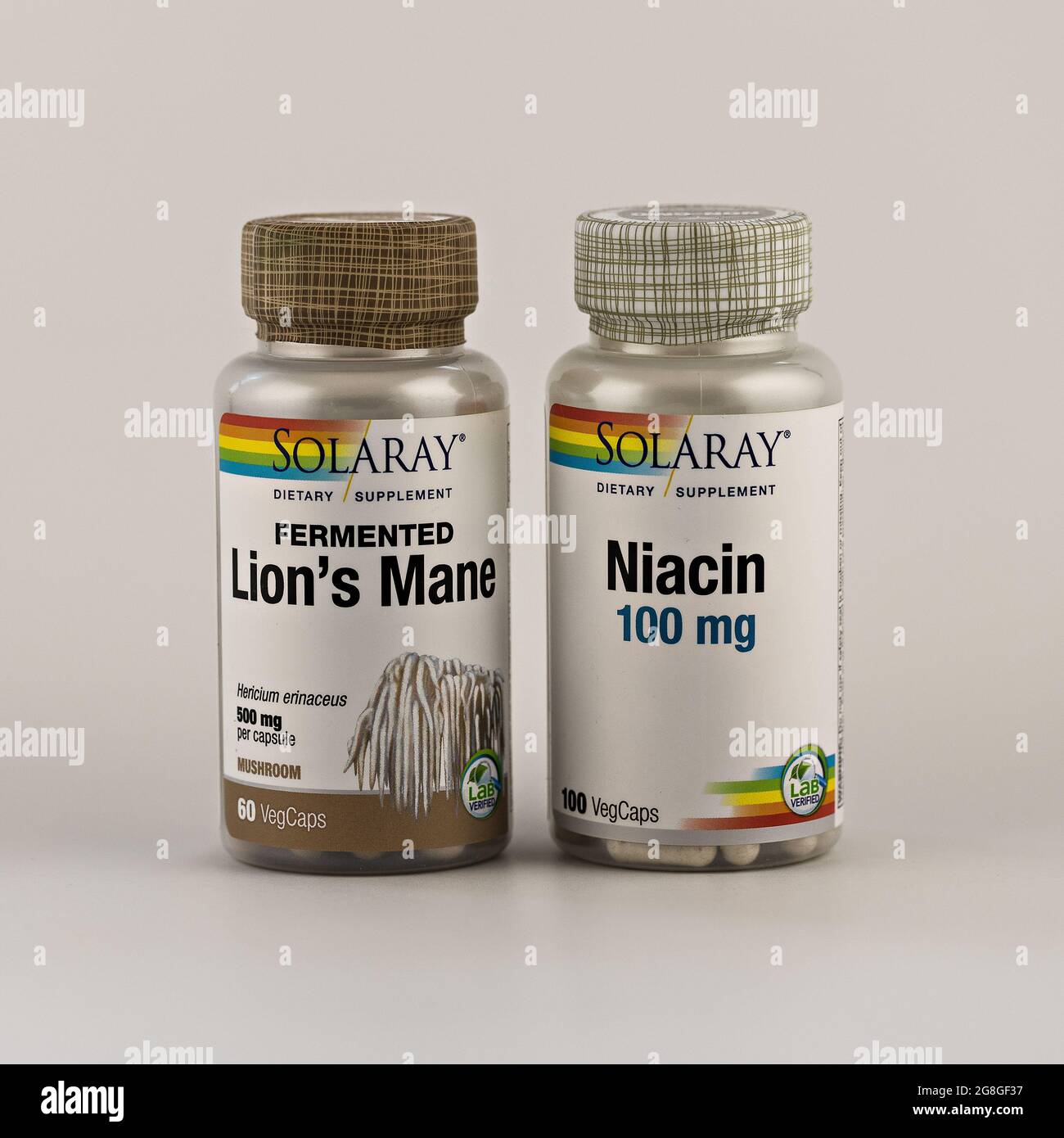 lion's mane capsules and niacin capsules in the jar. dietary supplement ...