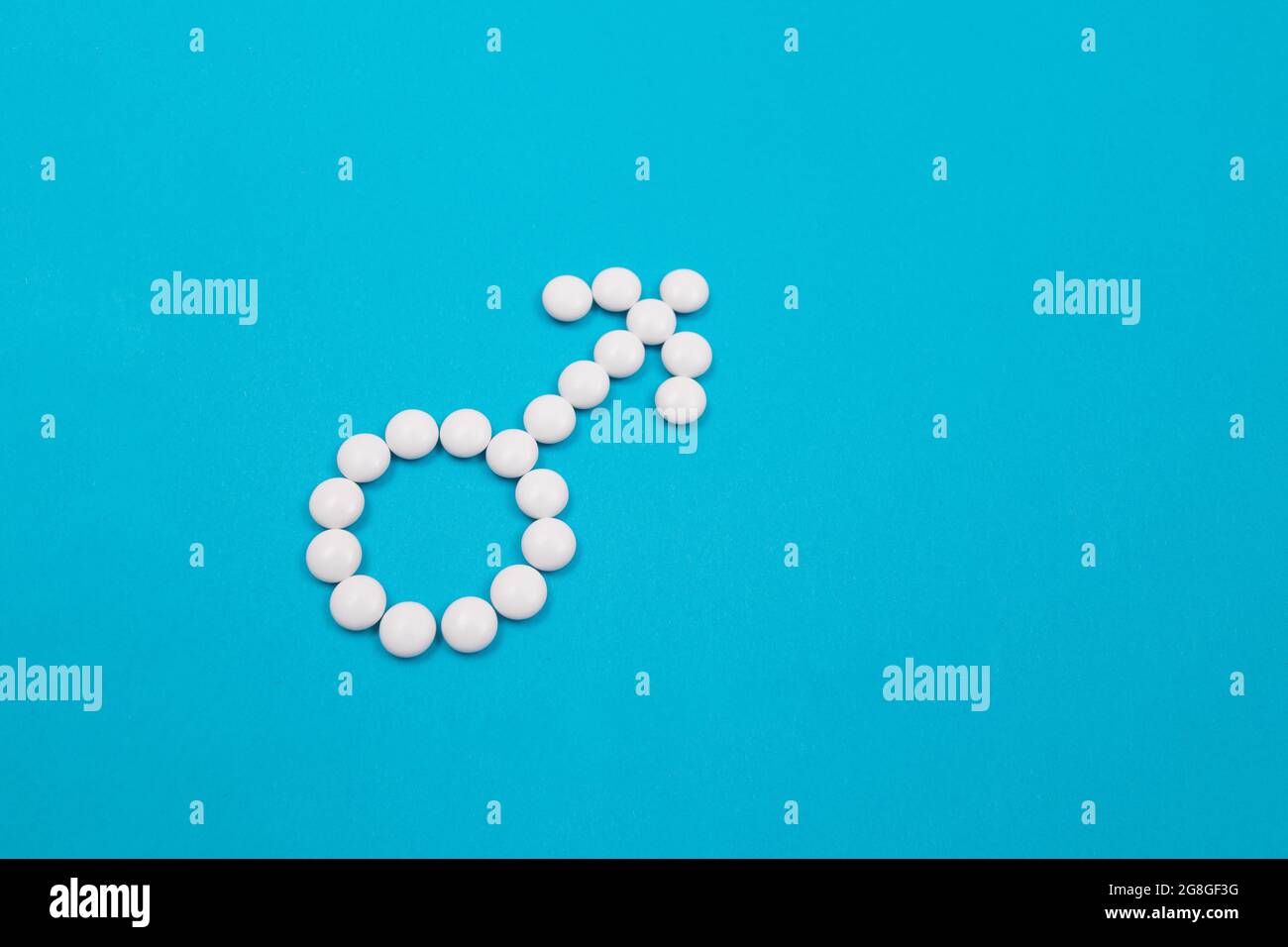 Male Gender Symbol Made from White Pills - Men's Health and Medicine ...