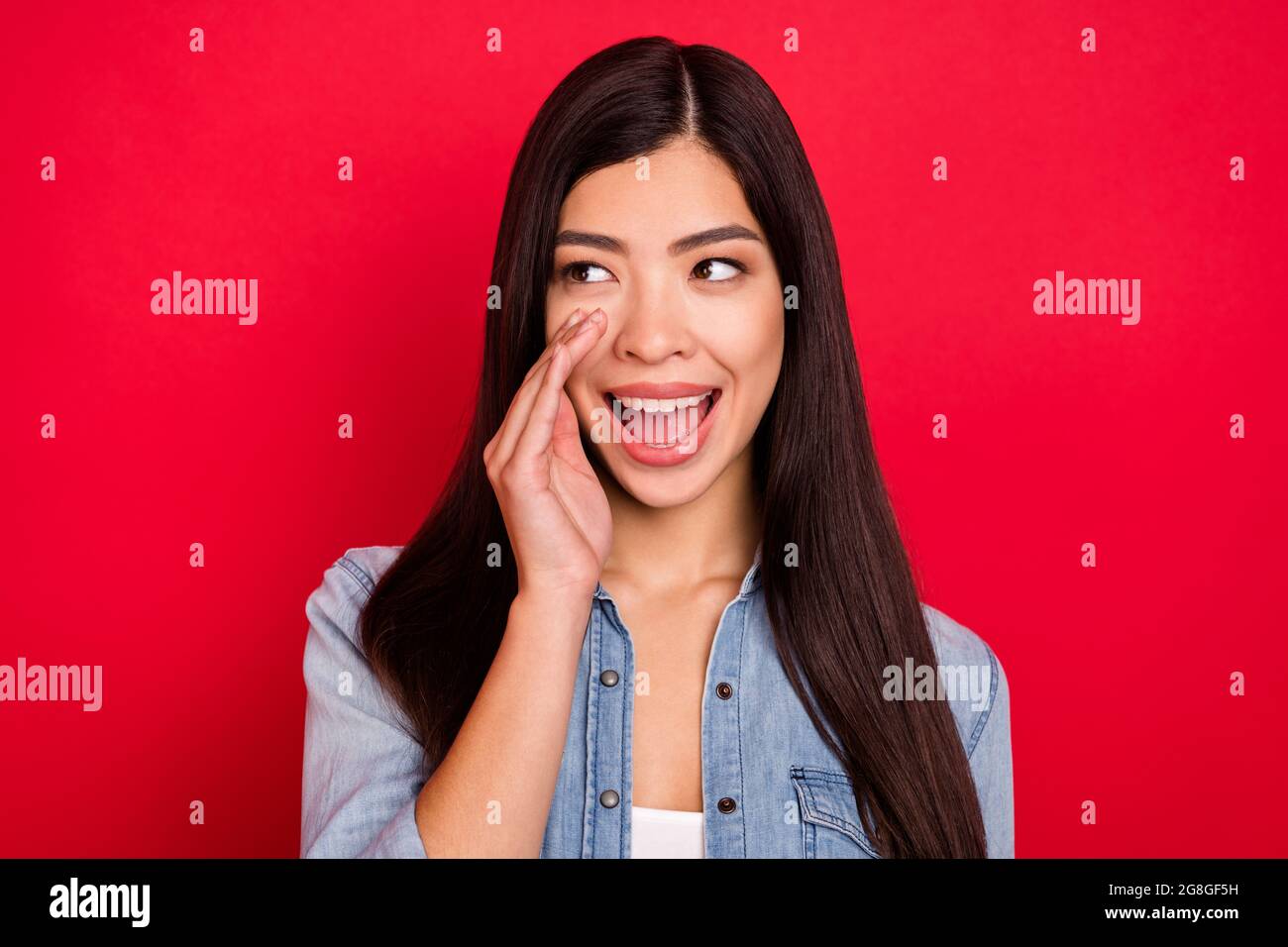 Photo of young attractive asian girl happy positive smile tell gossip ...