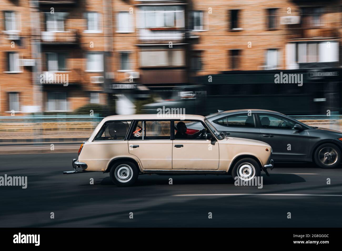 Ukraine, Kyiv - 16 July 2021: Beige LADA 2101 car moving on the street ...