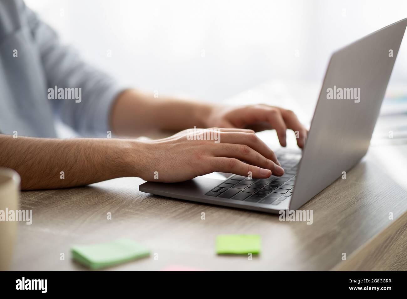 Working at laptop pc. Man typing text or programming code on computer ... Working at laptop pc. Man typing text or programming code on computer ...